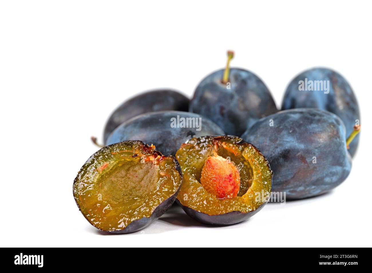 Ripe plums isolated against white background Stock Photo - Alamy