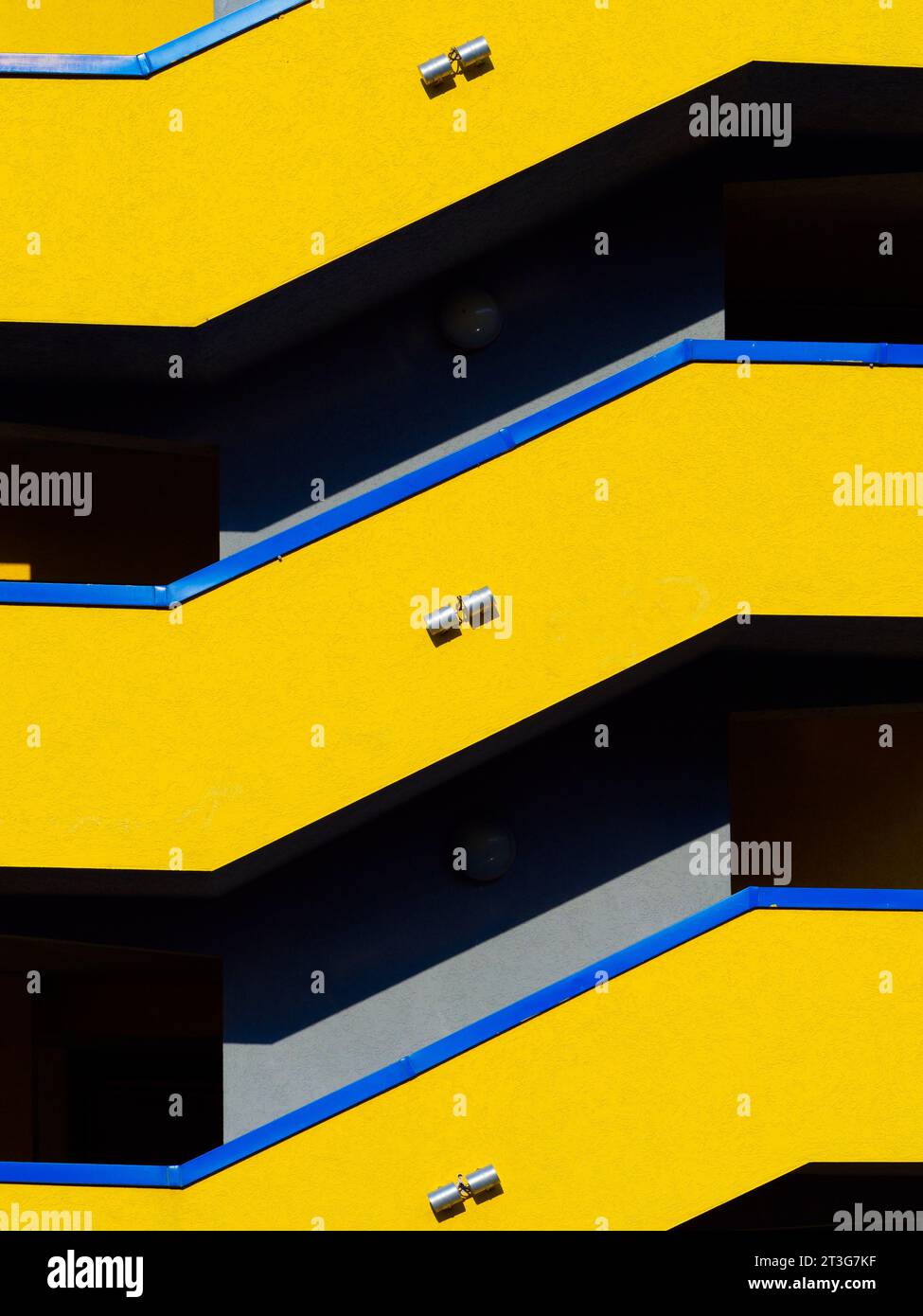 Repeating pattern in street architecture. Abstract background. Yellow ...