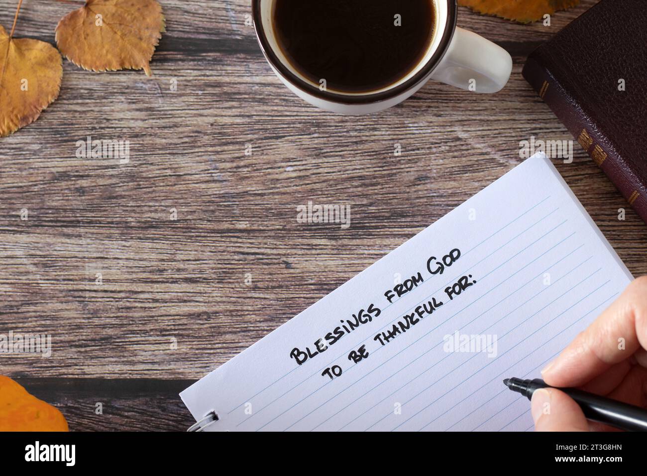 Hand writing inspiring text "Blessings from God to be thankful for" in ...