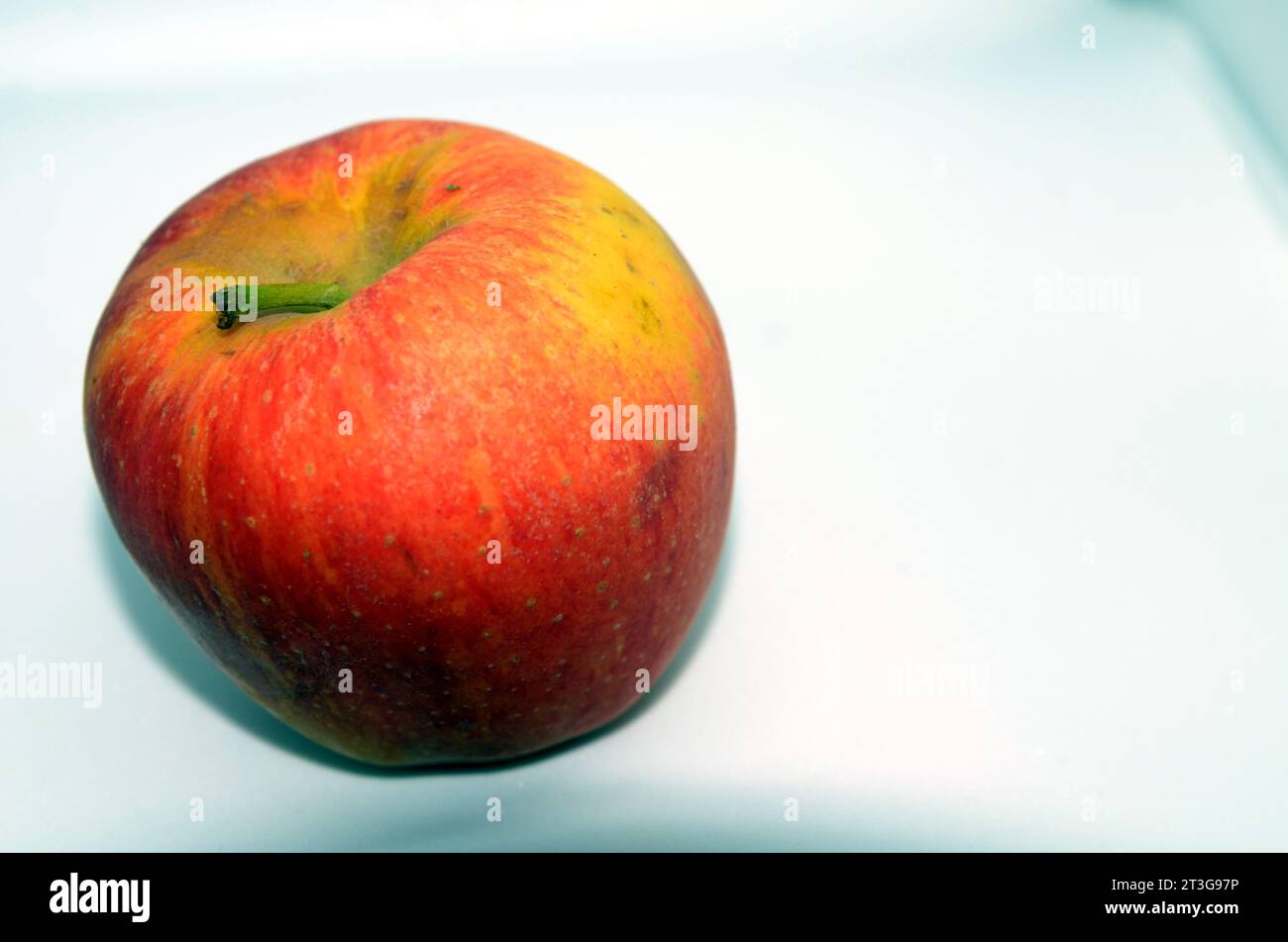A whole apple isolated on white background Stock Photo - Alamy