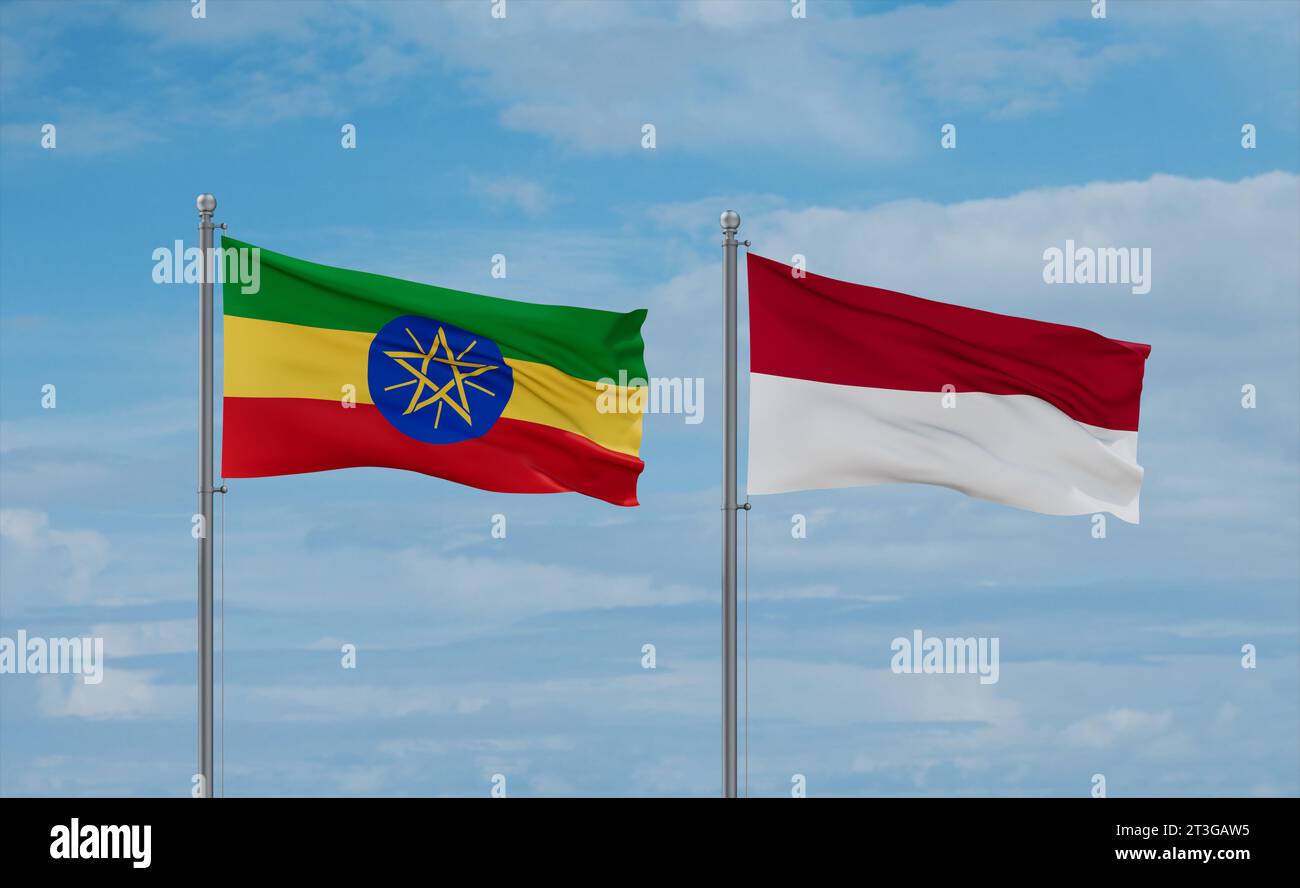 Indonesia and Ethiopia flags waving together on blue cloudy sky, two ...