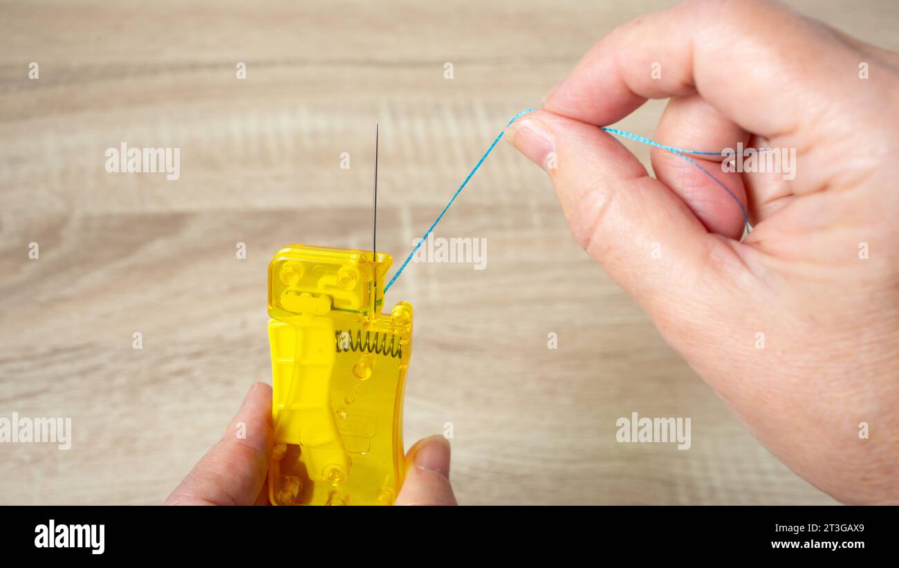 Threading a sewing machine hi-res stock photography and images - Alamy