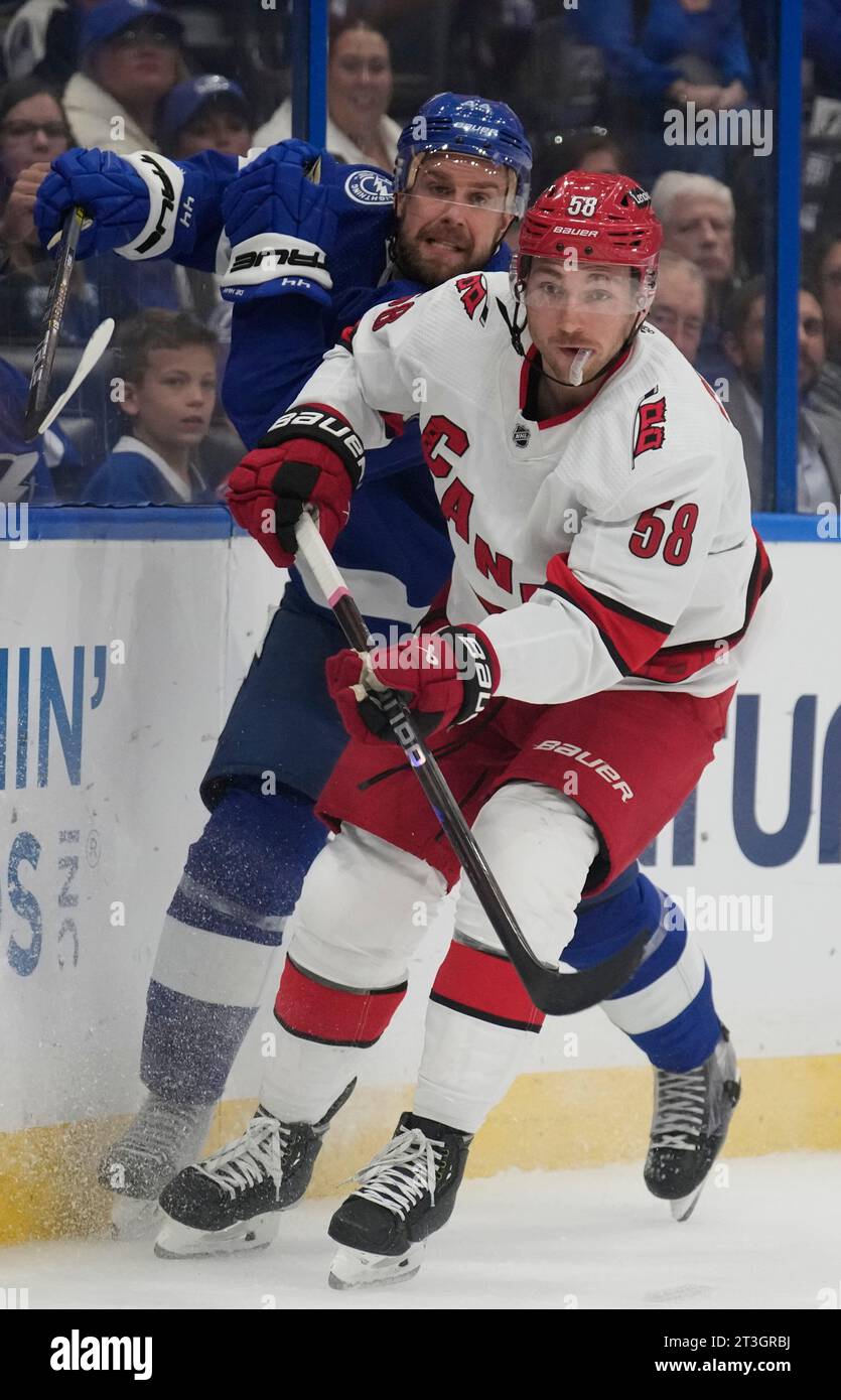 Carolina Hurricanes left wing Michael Bunting (58) works against Tampa ...
