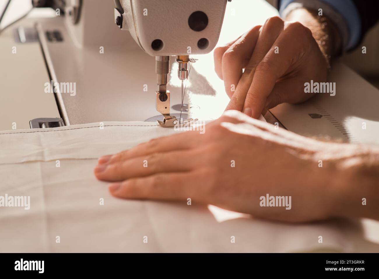Human Hands Fashion Designer Working On Sewing Machine Close-up Working ...