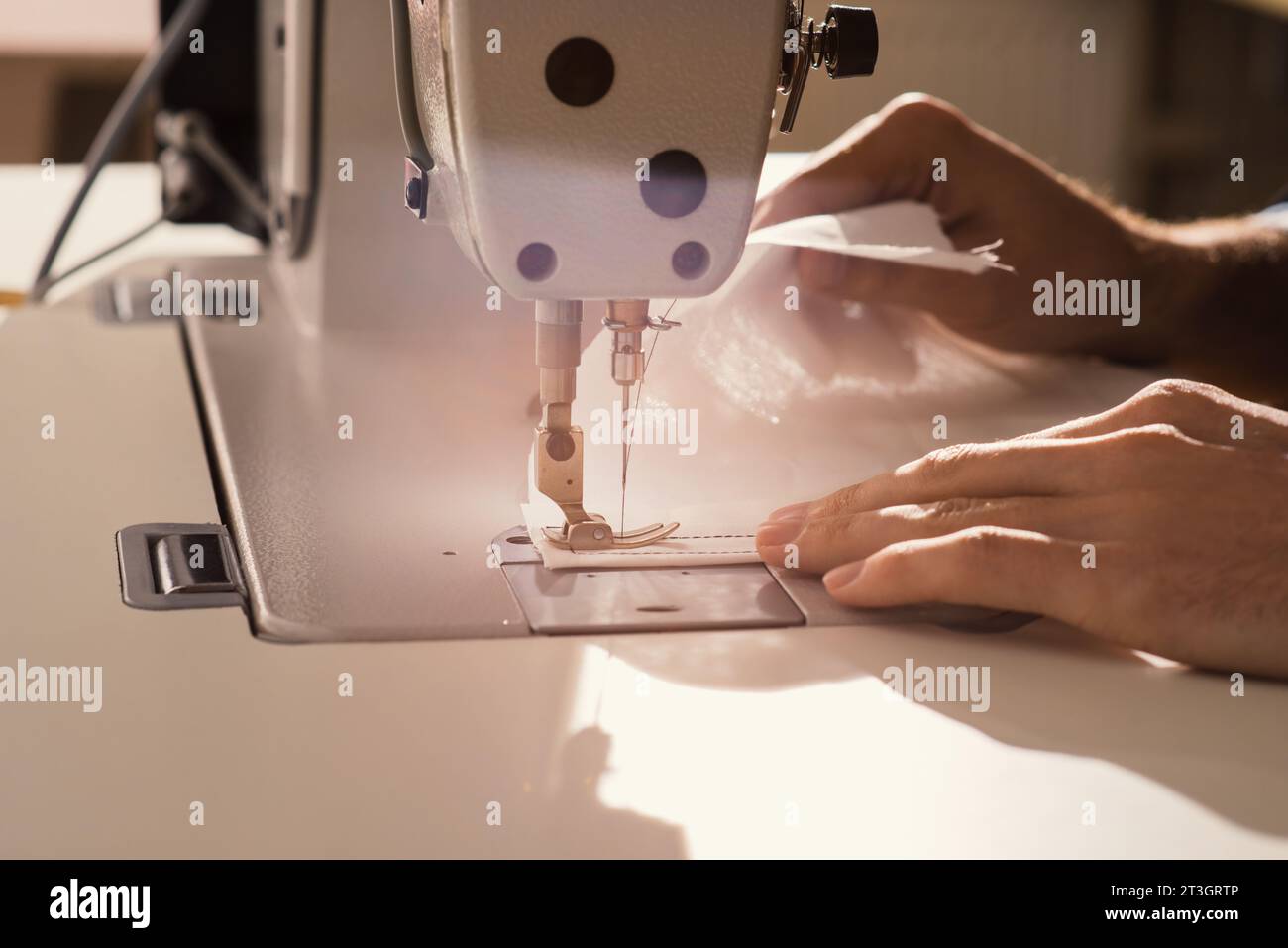 Human Hands Fashion Designer Working On Sewing Machine Close-up Working ...