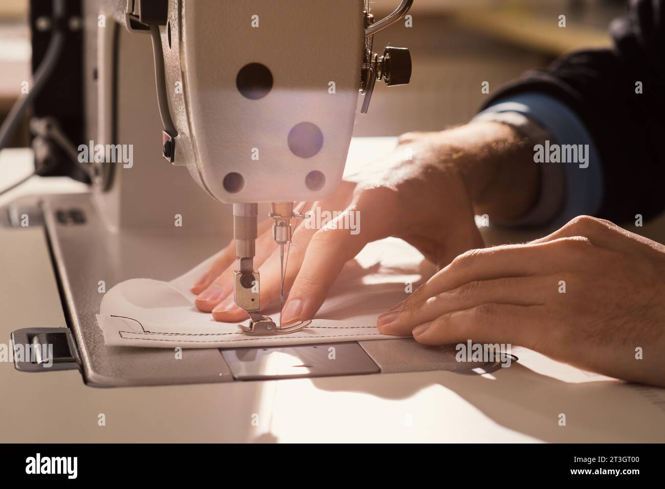 Human Hands Fashion Designer Working On Sewing Machine Close-up Working ...