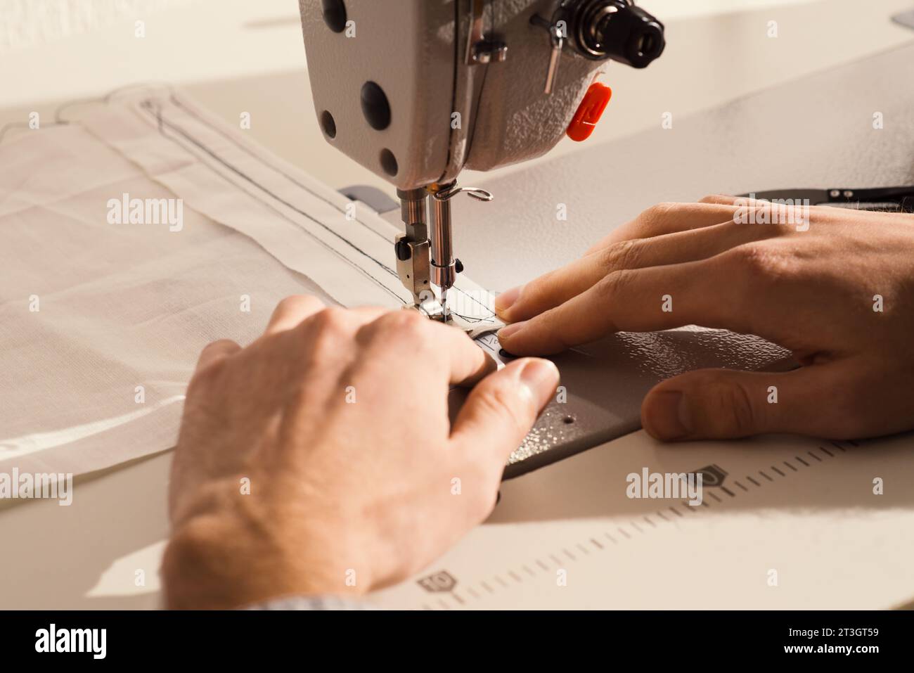Human Hands Fashion Designer Working On Sewing Machine Close-up Working ...