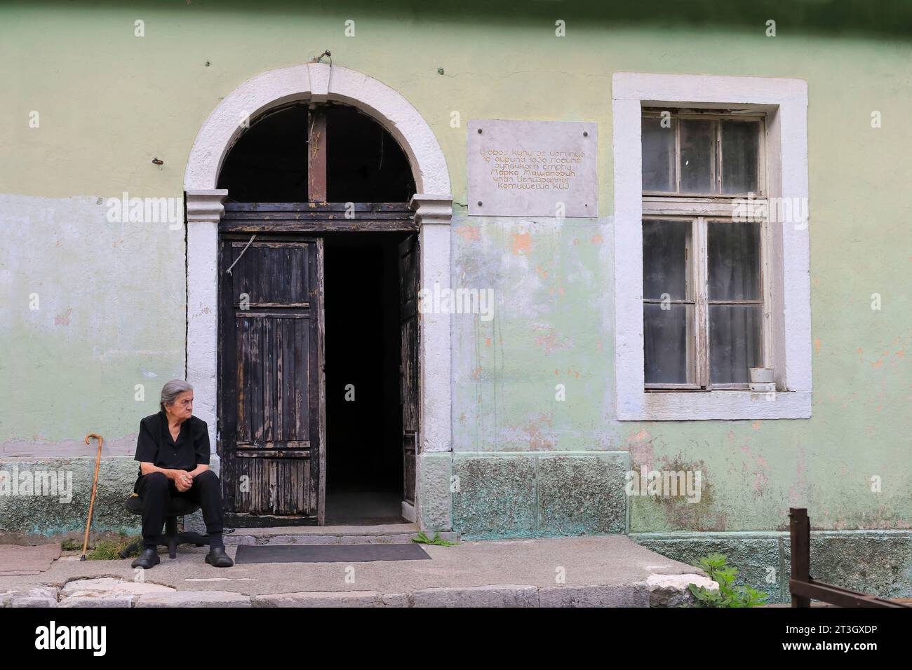 Montenegro, Cetinje, Njegoševa, old woman on her doorstep Stock Photo ...