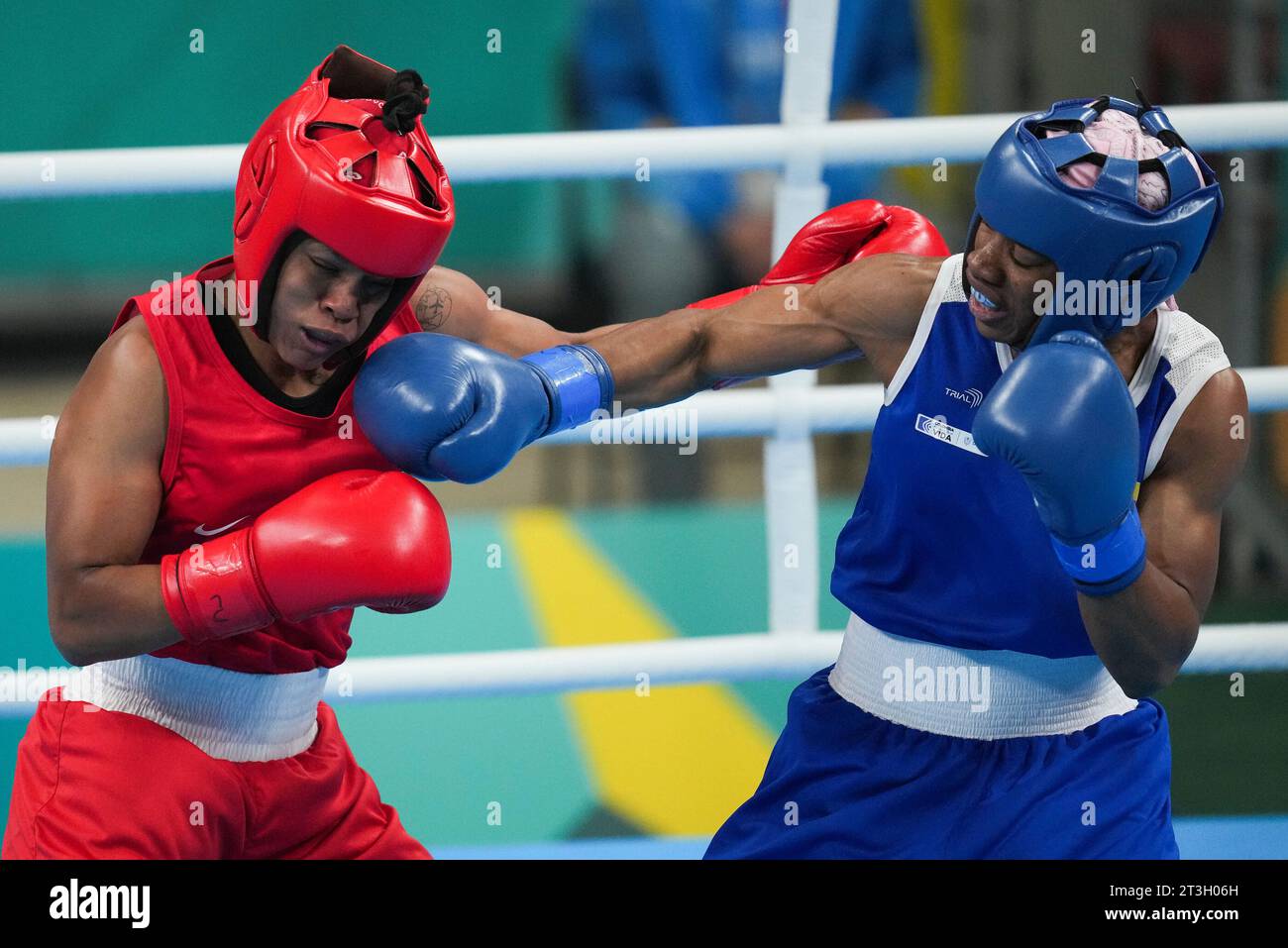 Colombia's Angie Valdes, right, fights Venezuela's Krisandy Rios during ...