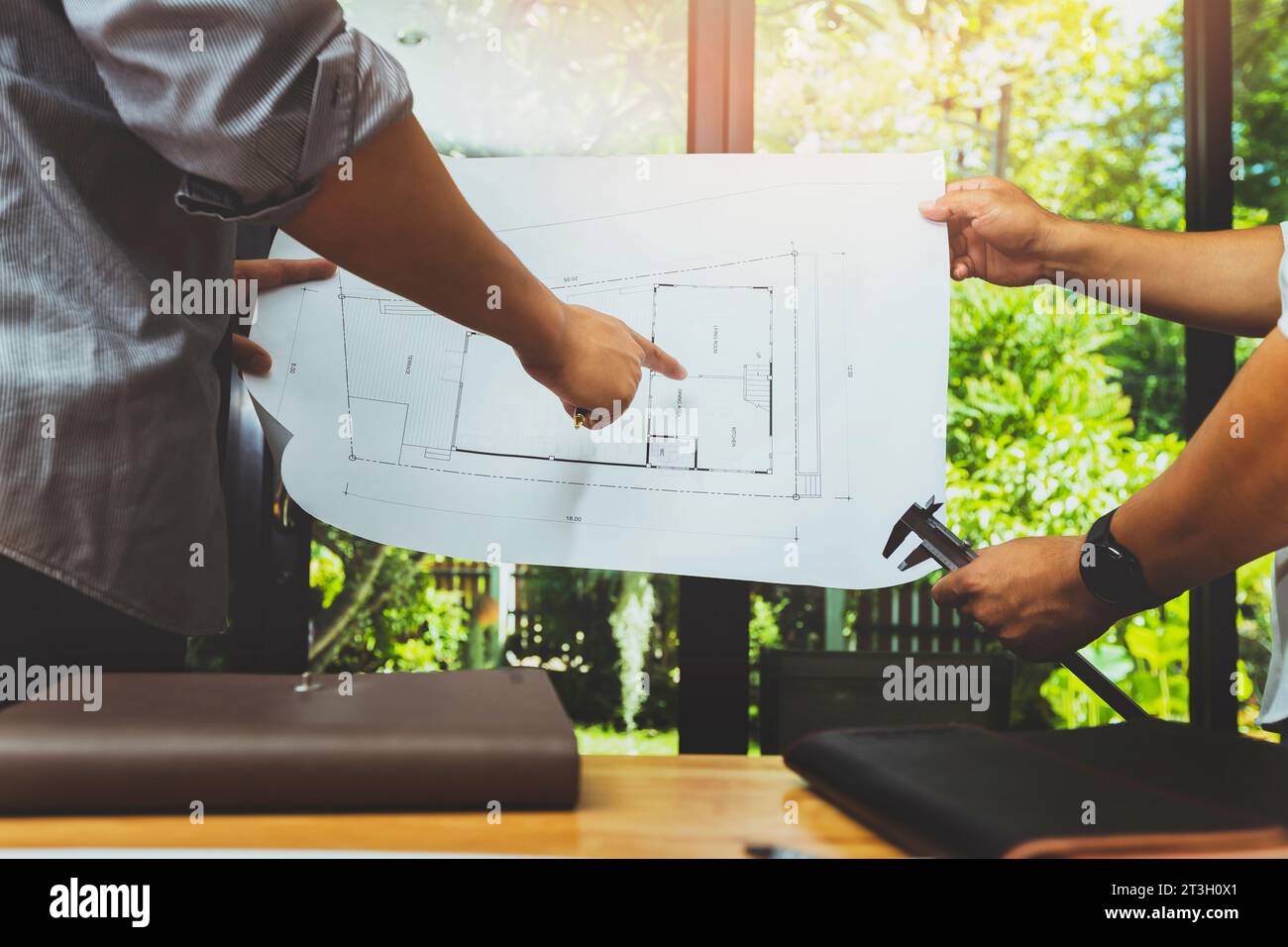 Confident team of architect working together in a office.They ...