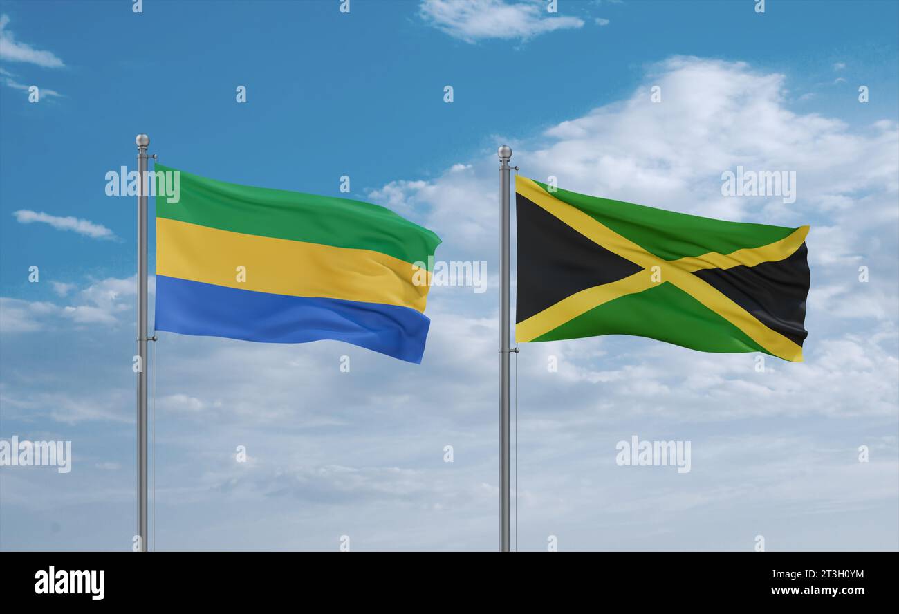 Jamaica and Gabon flags waving together in the wind on blue cloudy sky, two country relationship ...