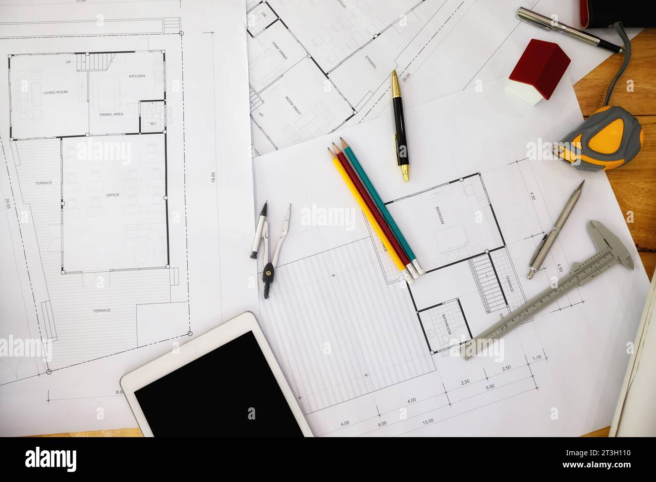 Construction blueprints with tools and tablet, top view. Tablet with ...