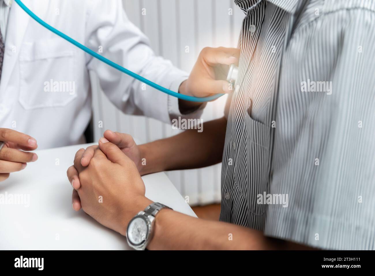 Doctor Checking Patient With Stethoscope. Doctor listening to patient ...