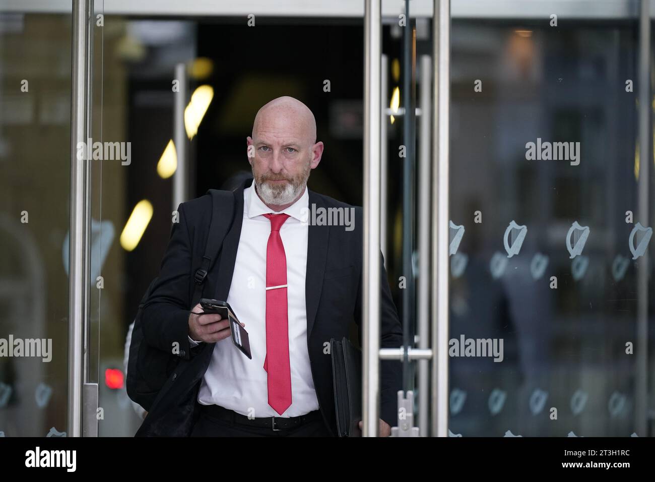 Detective Garda Fergus Hogan leaves Dublin Central Criminal Court where ...