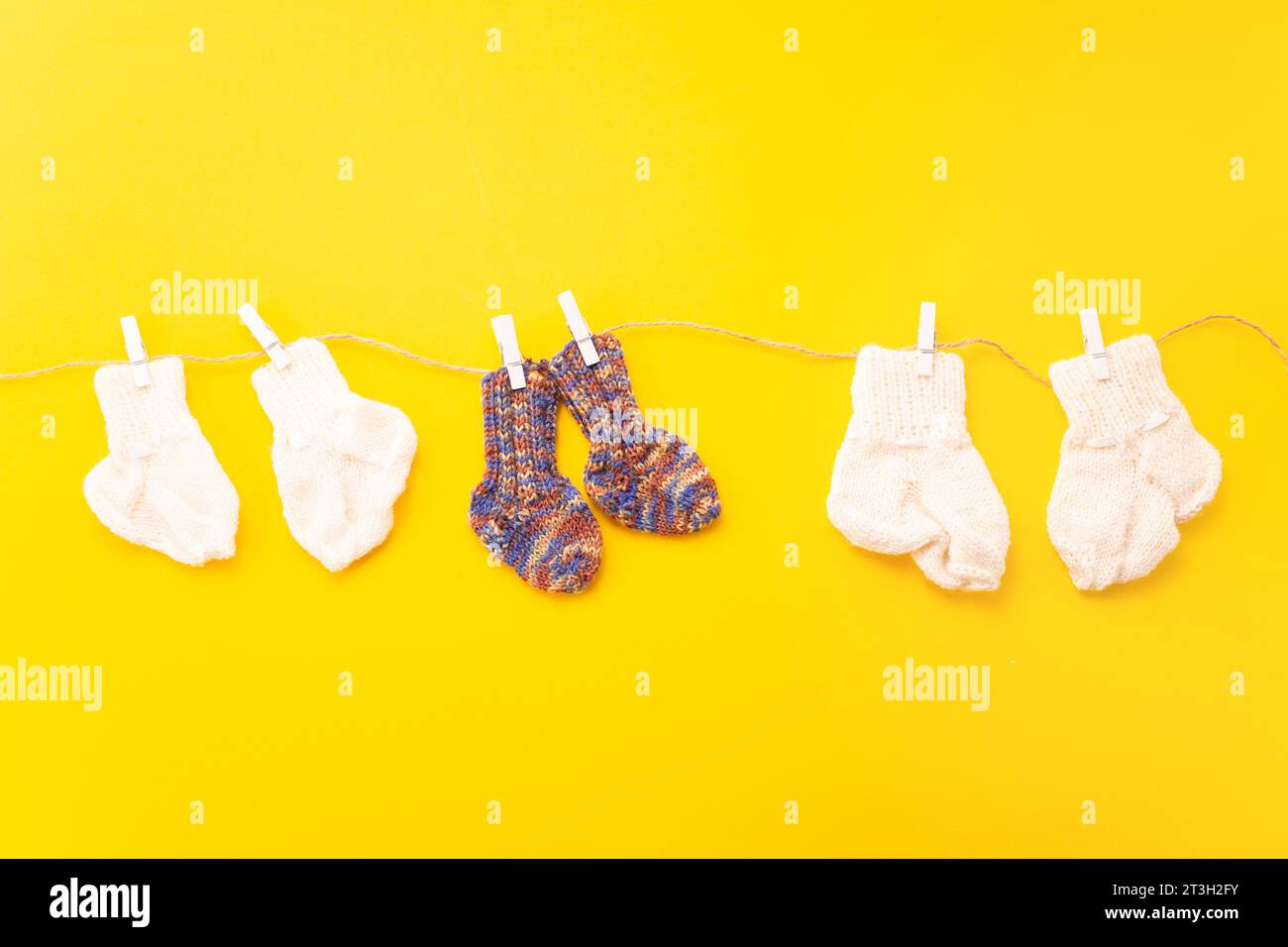 November 17, World Prematurity Day, Normal size and Tiny socks on rope ...