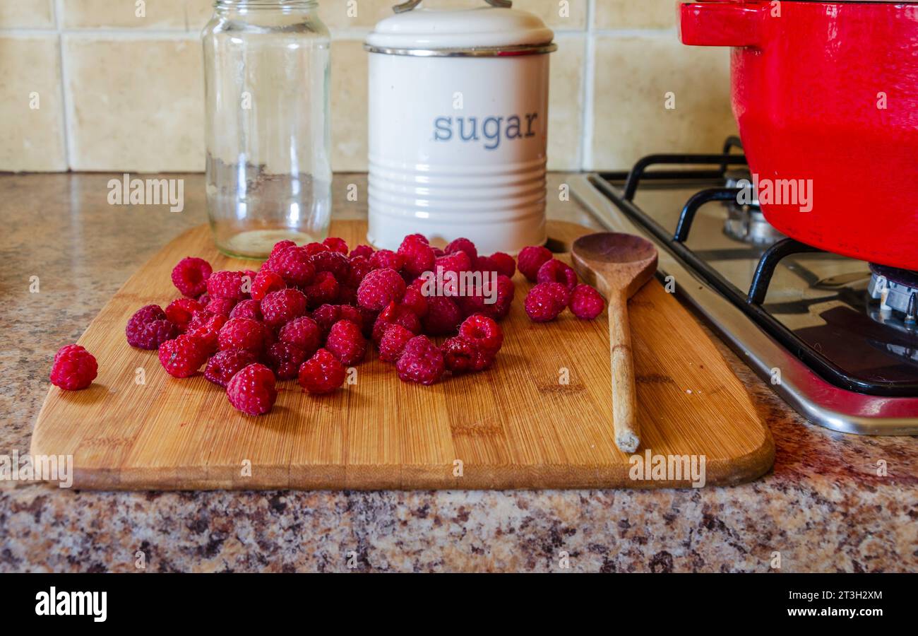 Jam making equipment including fresh raspberries and preserving pan ...