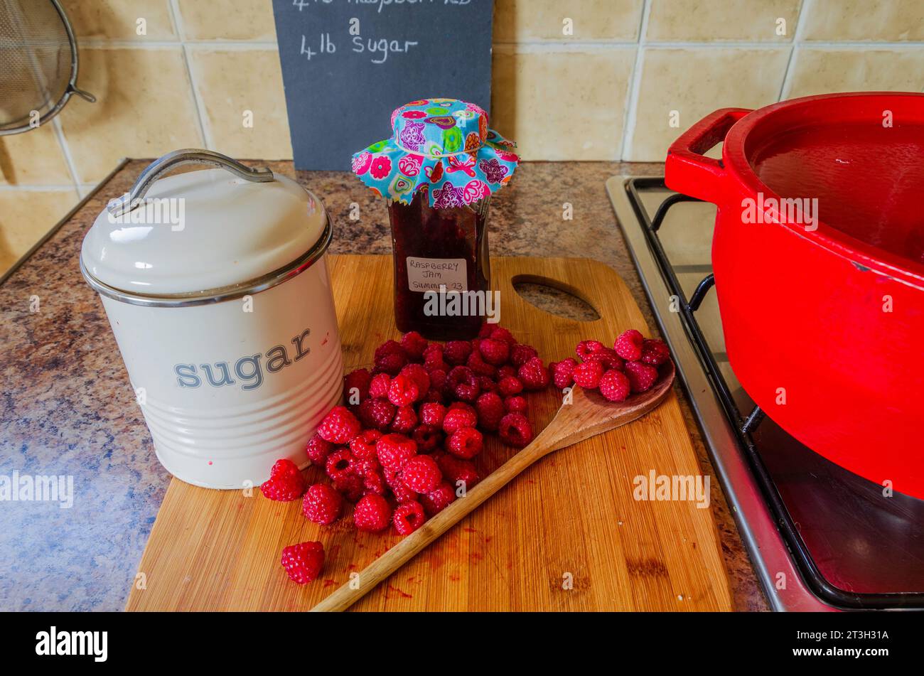 Jam making equipment including fresh raspberries and preserving pan ...