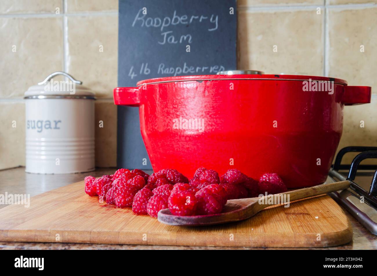 Jam making equipment including fresh raspberries and preserving pan ...
