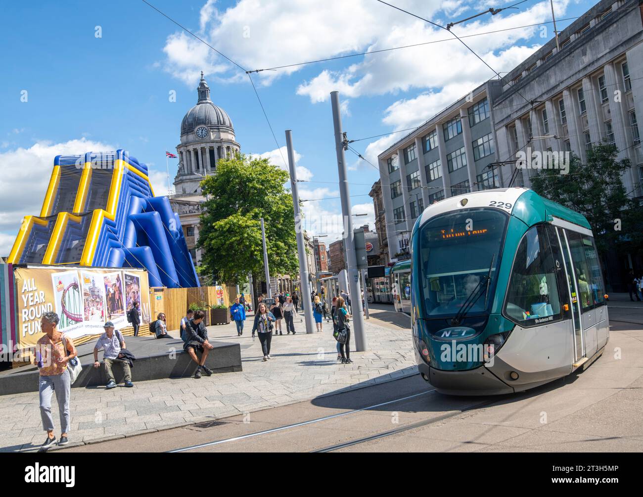 Tram passing Nottingham Beach in the Market Square, Nottinghamshire ...