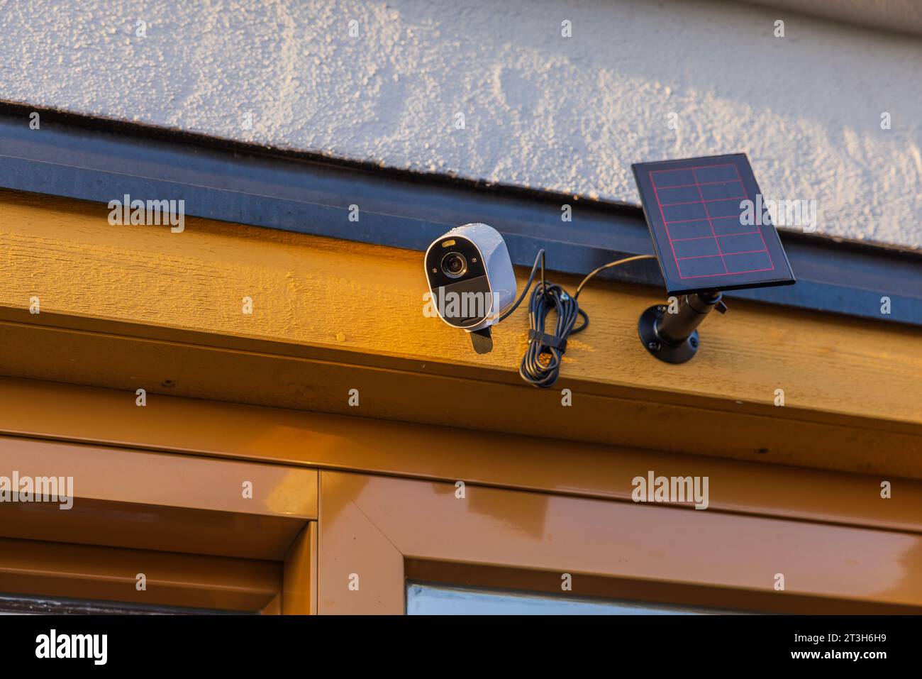 Close up view of high-tech outdoor security camera equipped with solar ...