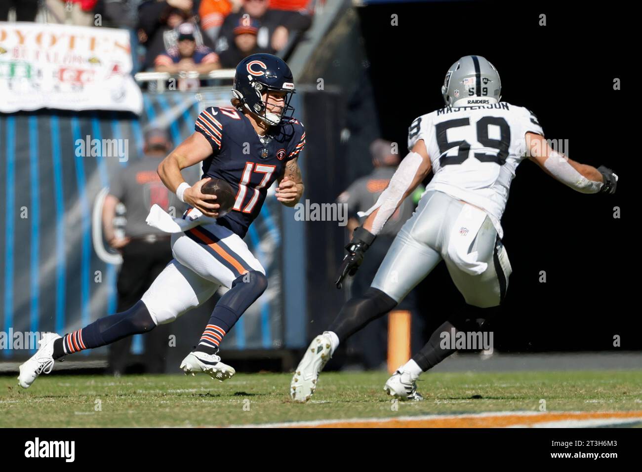 Chicago Bears quarterback Tyson Bagent (17) runs with the ball against ...