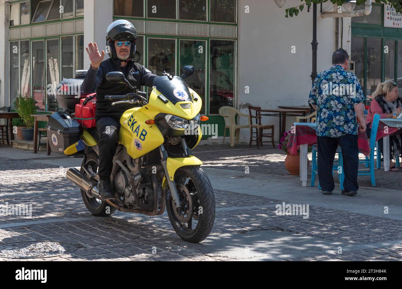 Mochos, Crete, Greece. 30.09.2023. A EKAB member riding a motorcycle in Mochos central Crete ...