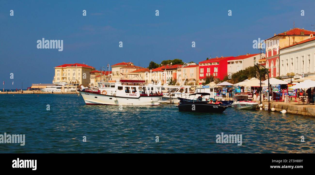 Cruise boats in the port of the historic city of Poreč on the Istria ...