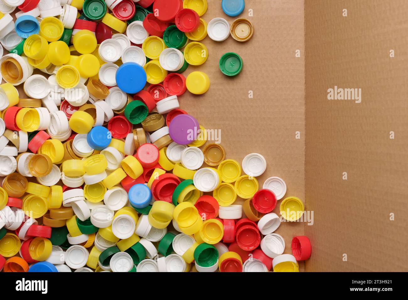 Used PET recycling plastic bottle cap plastic lids. Colorful bottle ...