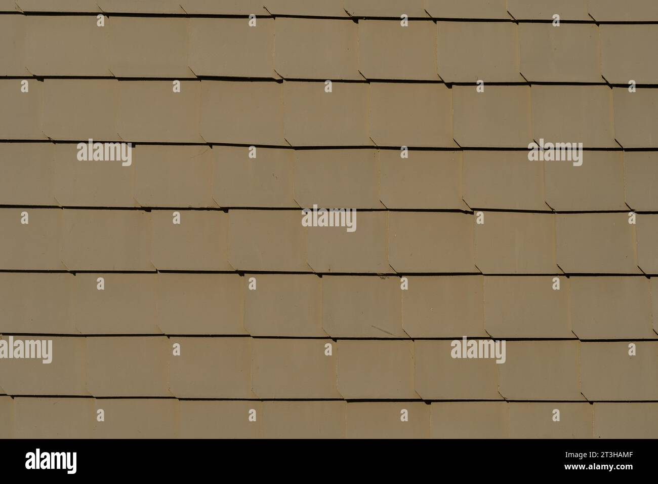 Brown texture of lamellar tiles on the roof. Texture and backgrounds ...
