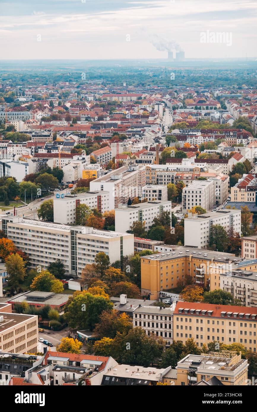 apartment blocks in the German city of Leipzig. Cooling stacks from a ...
