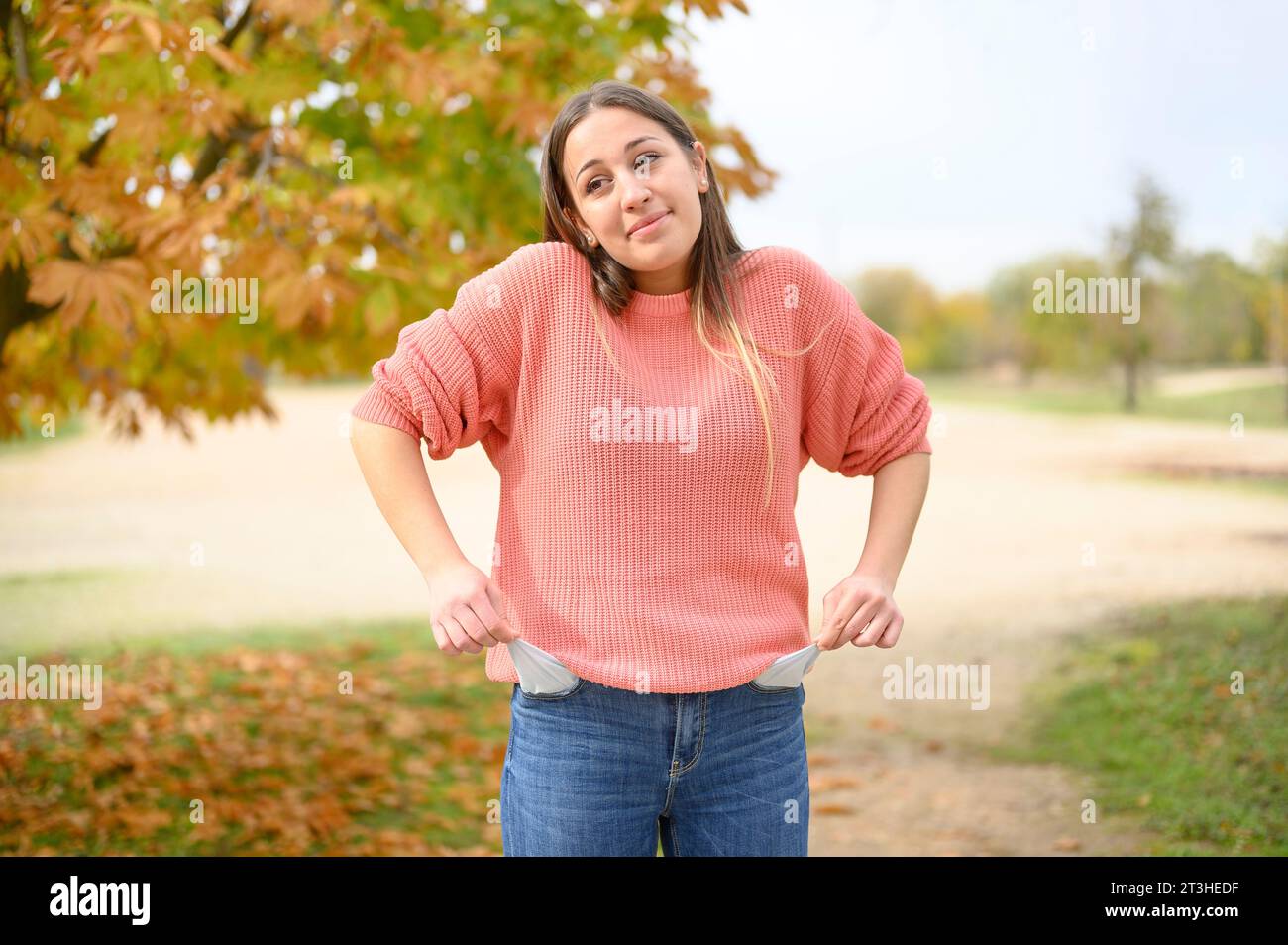 Empty pockets woman hi-res stock photography and images - Alamy