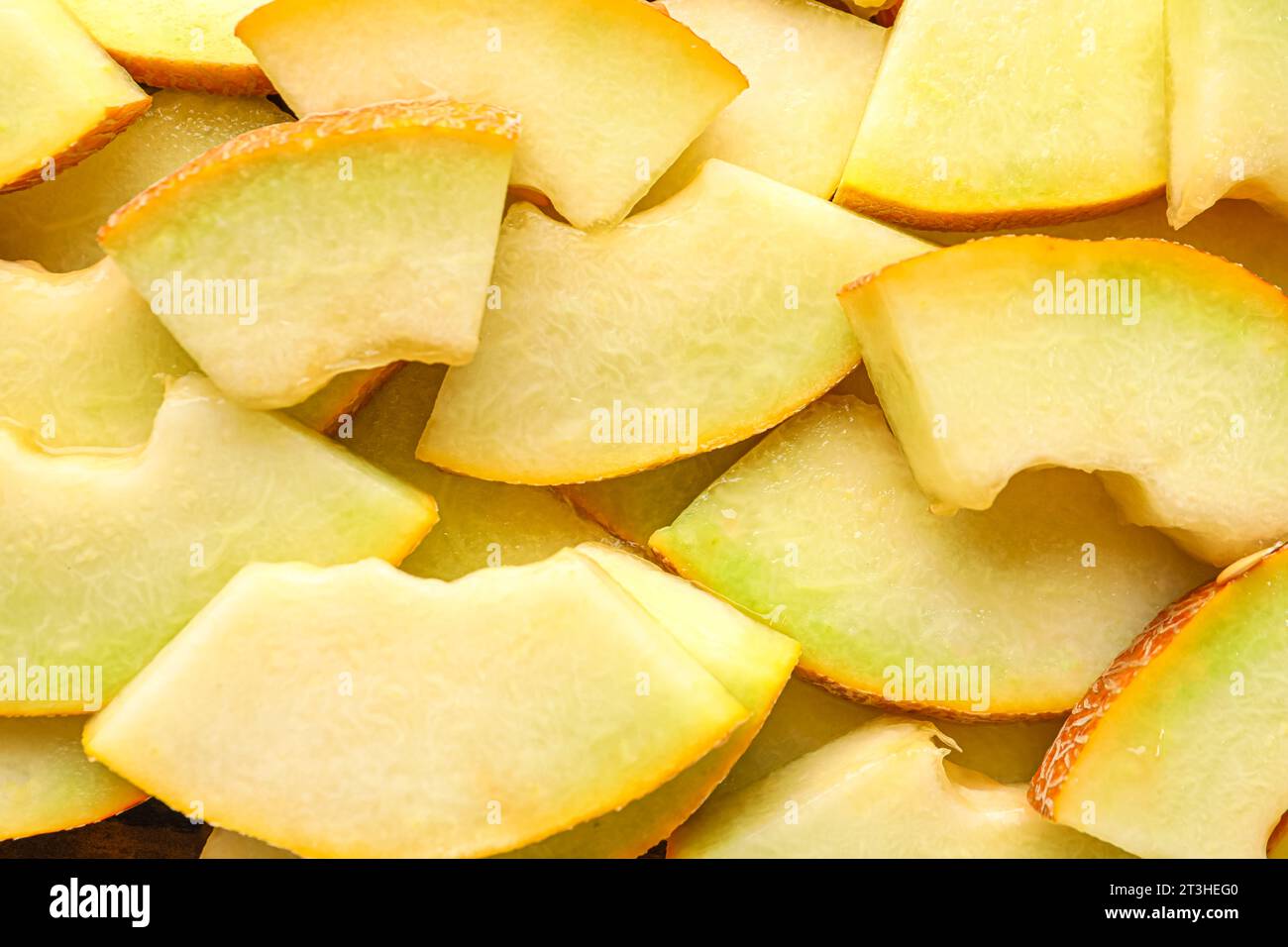 Texture of sweet cut melons as background Stock Photo - Alamy