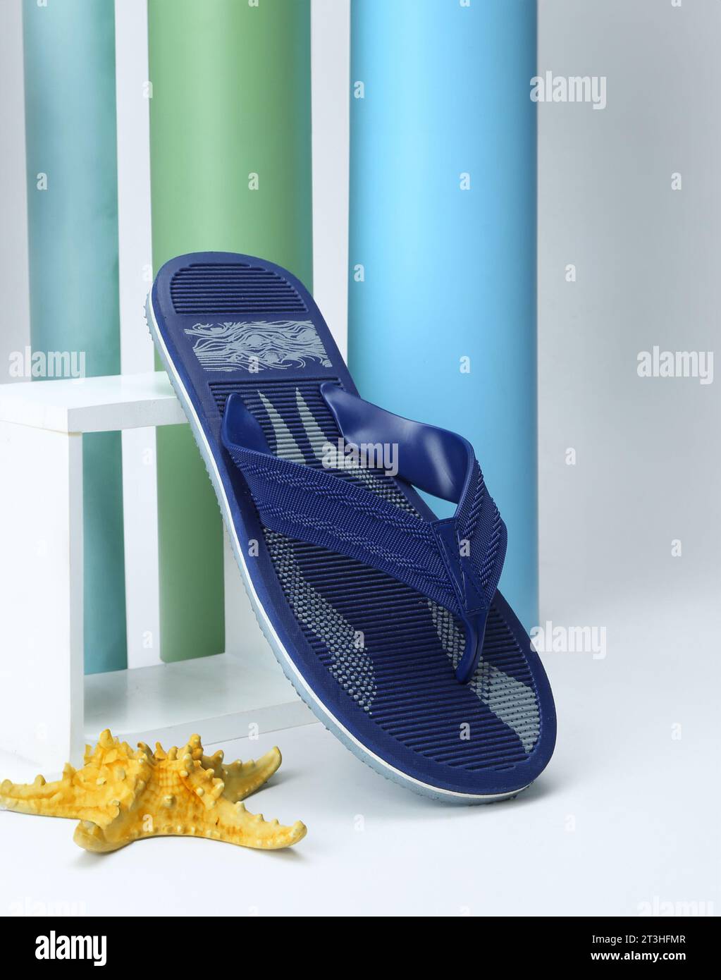 trendy unisex flip flops crative poster shot Stock Photo - Alamy