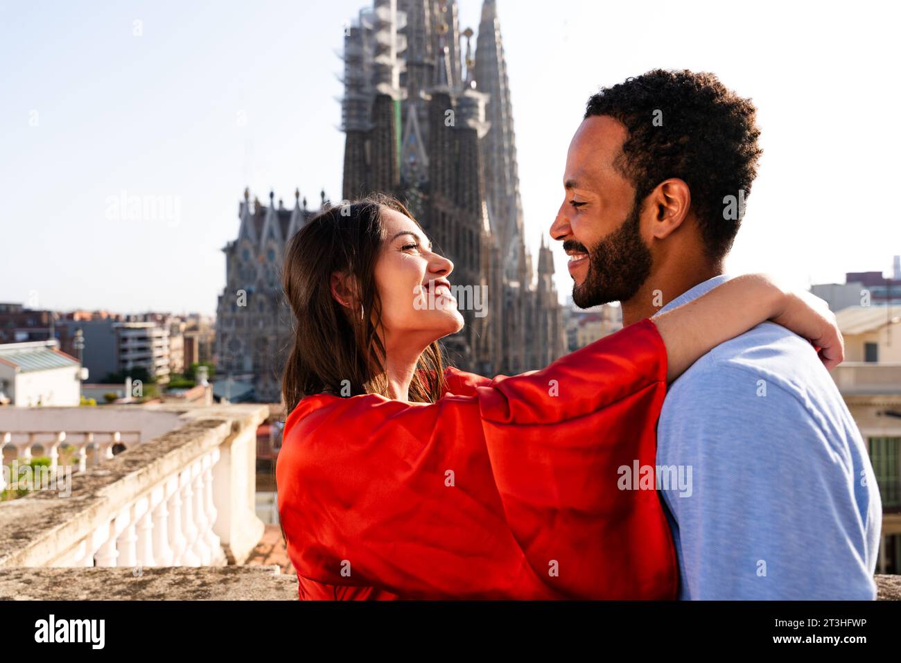Multiracial beautiful happy couple of lovers dating on rooftop balcony ...