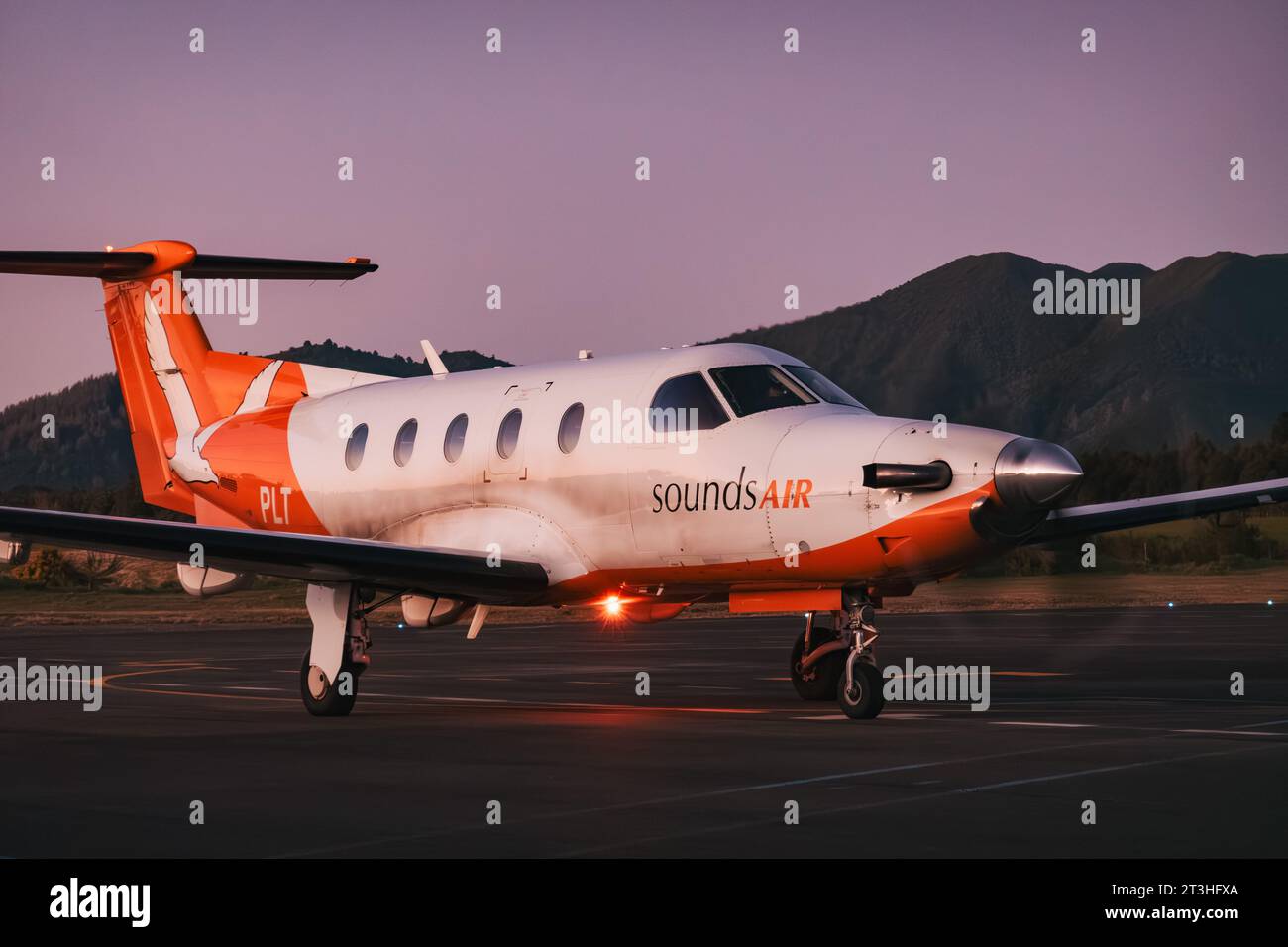 a Soundsair Pilatus PC-12 passenger plane starts its engine one evening ...