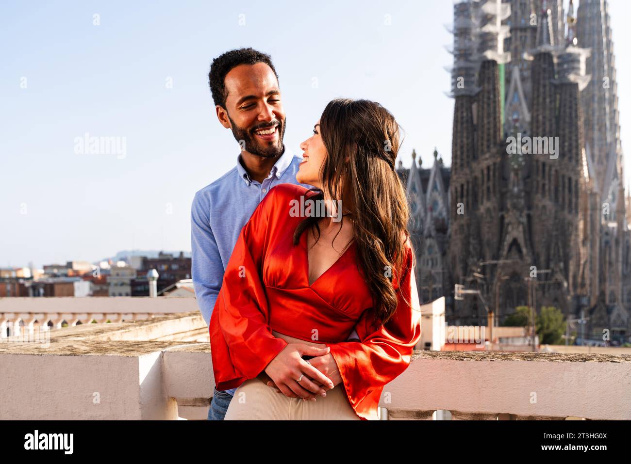 Multiracial beautiful happy couple of lovers dating on rooftop balcony ...