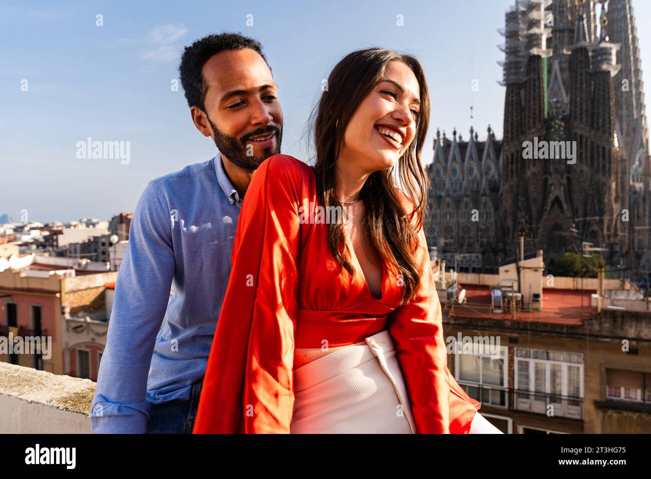 Multiracial beautiful happy couple of lovers dating on rooftop balcony ...
