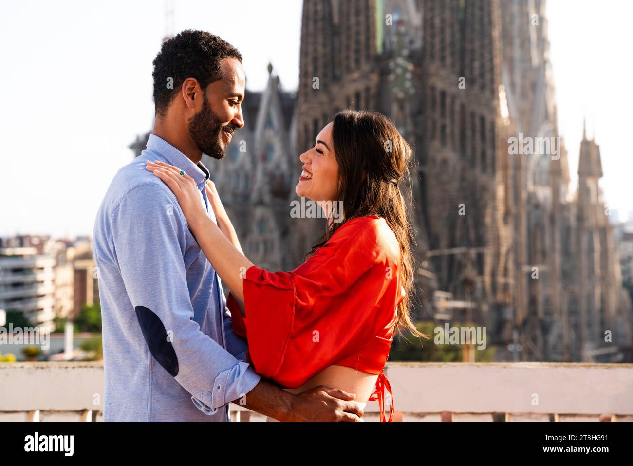 Multiracial beautiful happy couple of lovers dating on rooftop balcony ...
