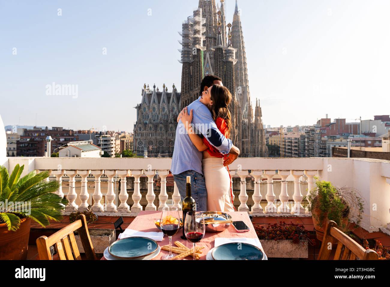 Multiracial beautiful happy couple of lovers dating on rooftop balcony ...
