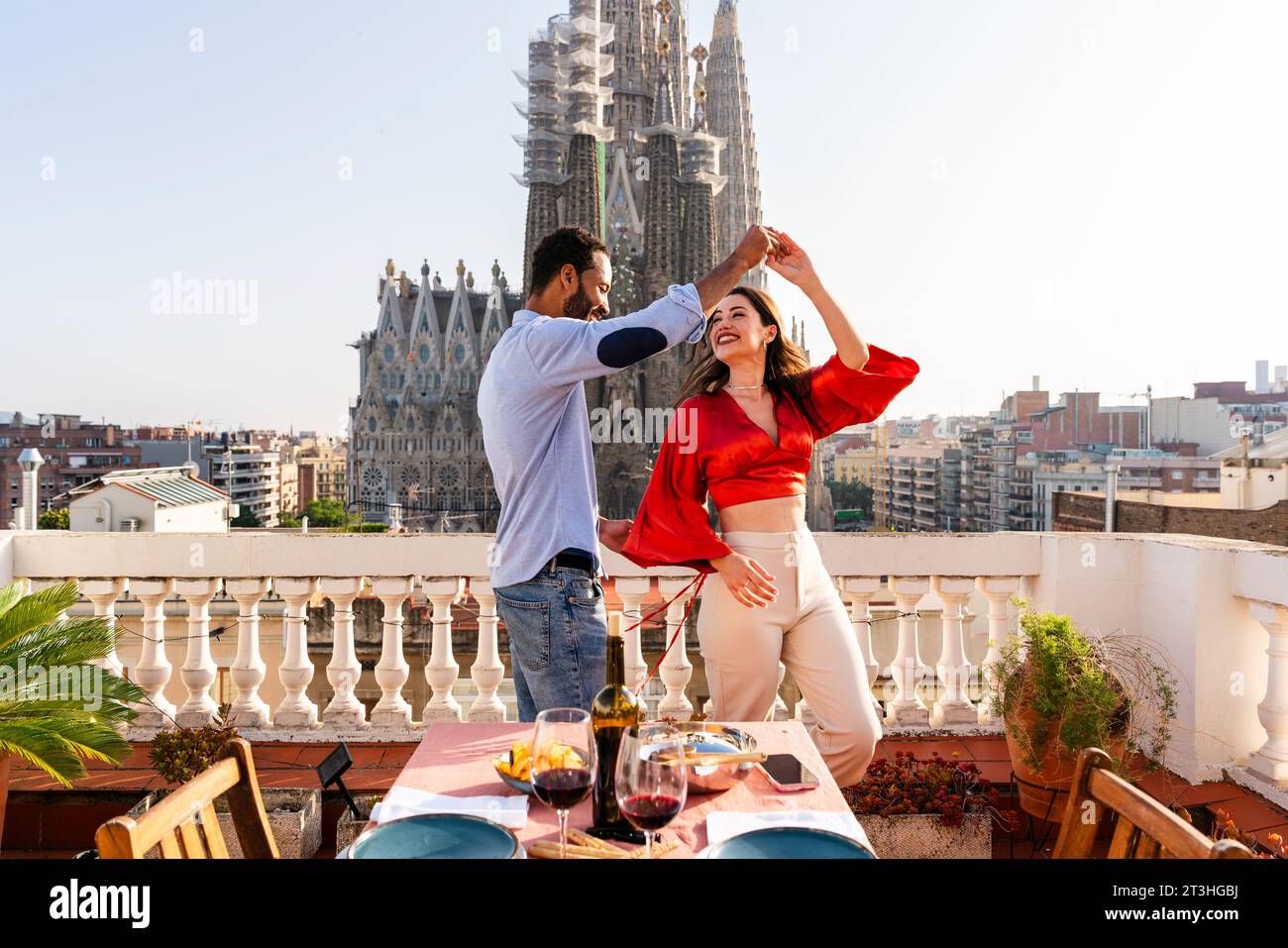 Multiracial beautiful happy couple of lovers dating on rooftop balcony ...