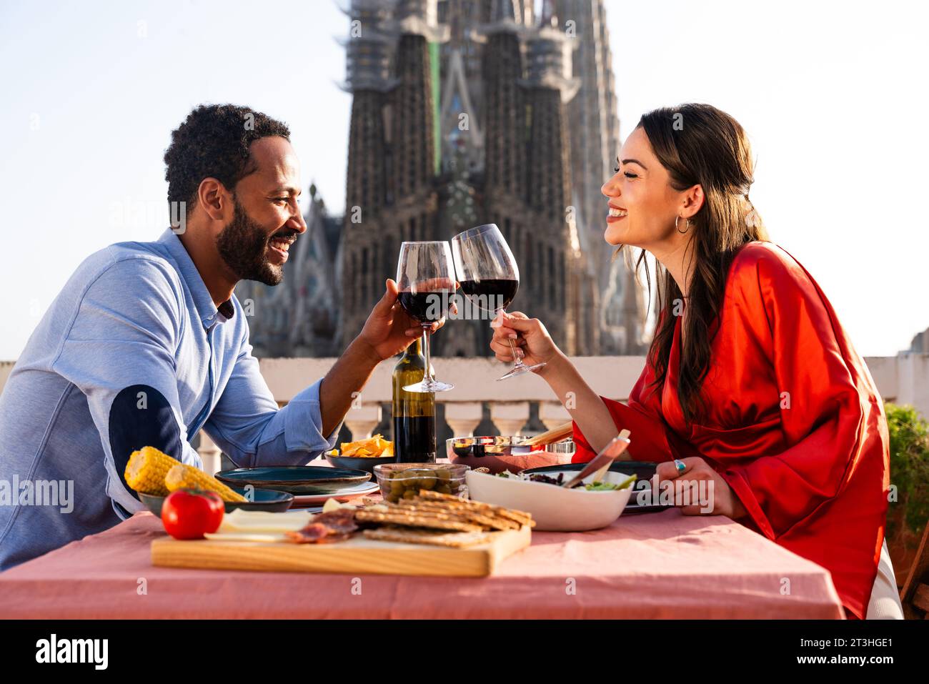 Multiracial beautiful happy couple of lovers dating on rooftop balcony ...
