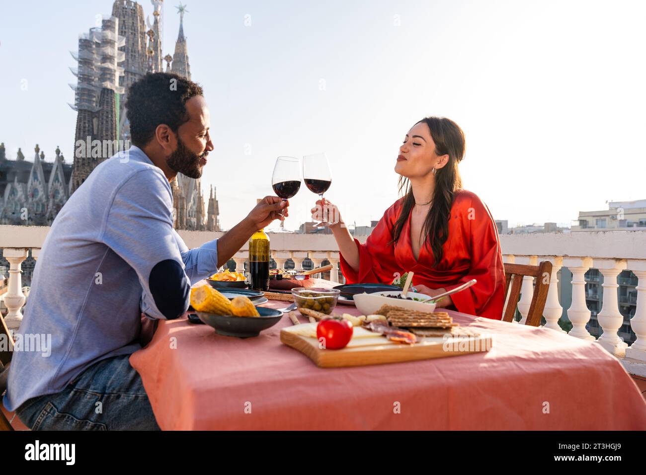 Multiracial beautiful happy couple of lovers dating on rooftop balcony ...