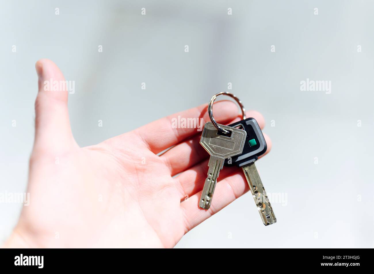 hands holding keys Stock Photo - Alamy