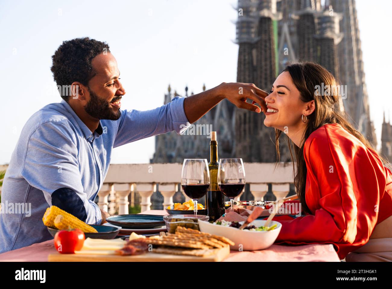 Multiracial beautiful happy couple of lovers dating on rooftop balcony ...