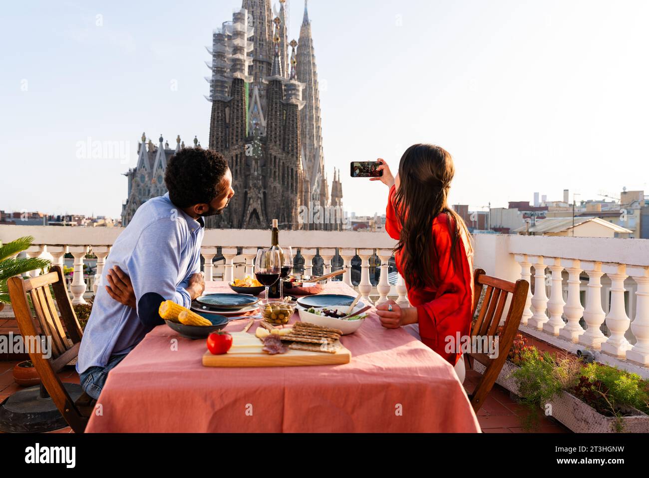 Multiracial beautiful happy couple of lovers dating on rooftop balcony ...