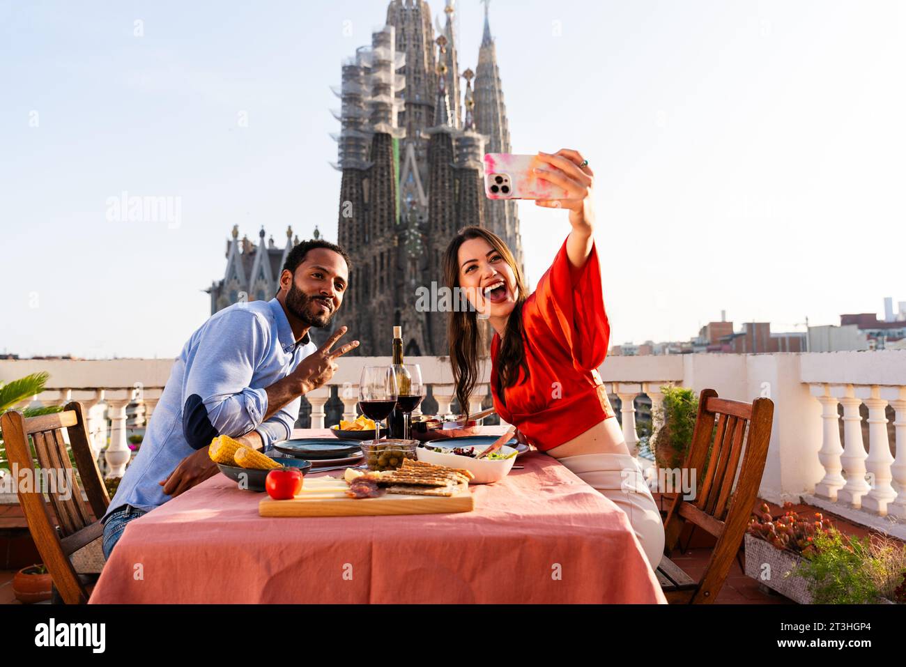 Multiracial beautiful happy couple of lovers dating on rooftop balcony ...