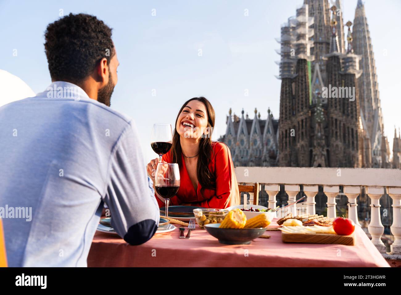 Multiracial beautiful happy couple of lovers dating on rooftop balcony ...
