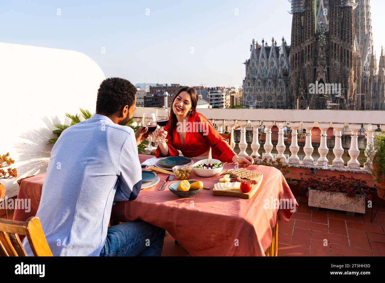 Multiracial beautiful happy couple of lovers dating on rooftop balcony ...