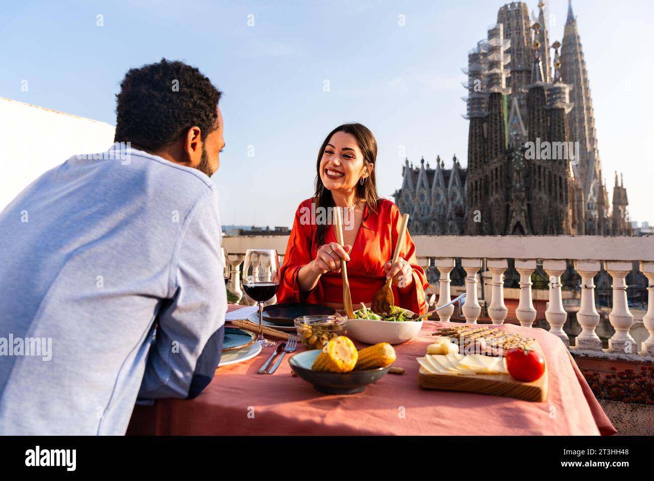 Multiracial beautiful happy couple of lovers dating on rooftop balcony ...