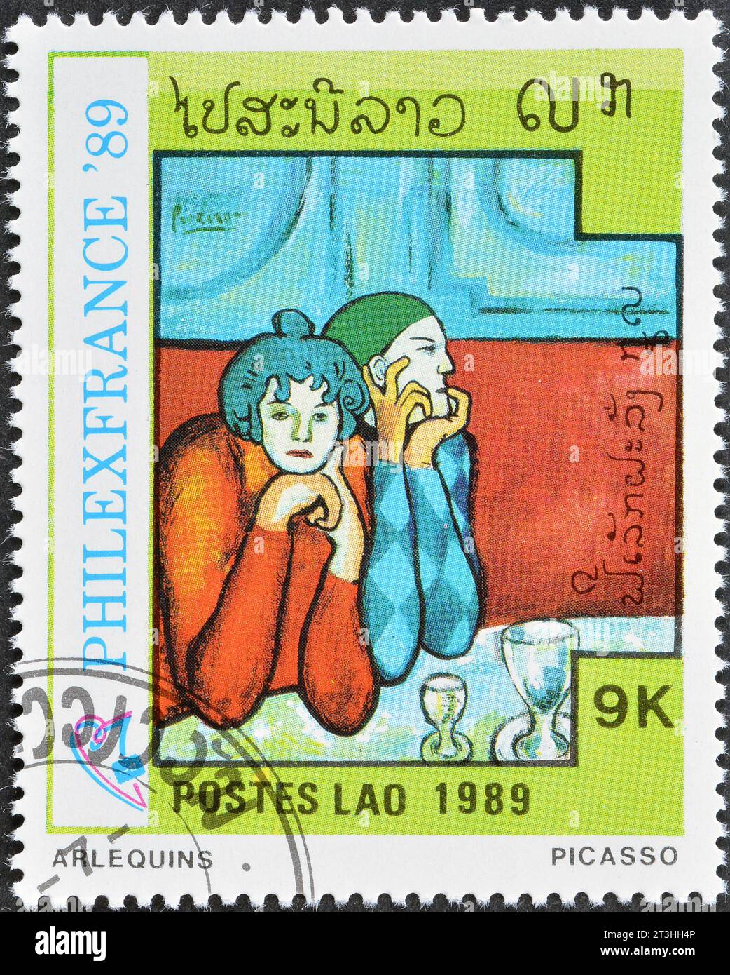 Cancelled postage stamp printed by Laos, that shows painting Harlequins ...